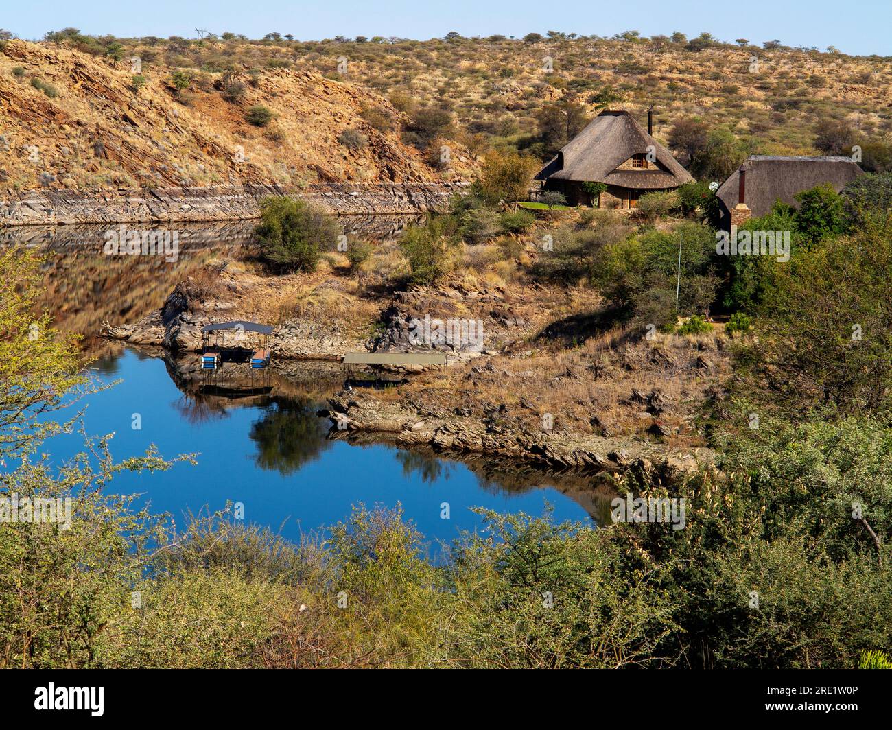 Beautuful bungalow at the shores of Lake Oanob Resort, Namibia Stock ...