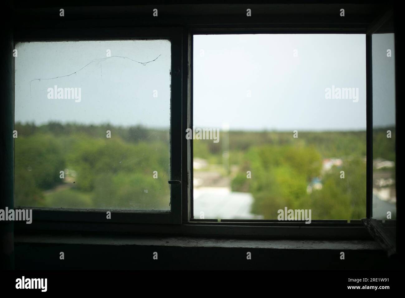 View from window on street. Dark room. Clear glass. Window frame Stock ...