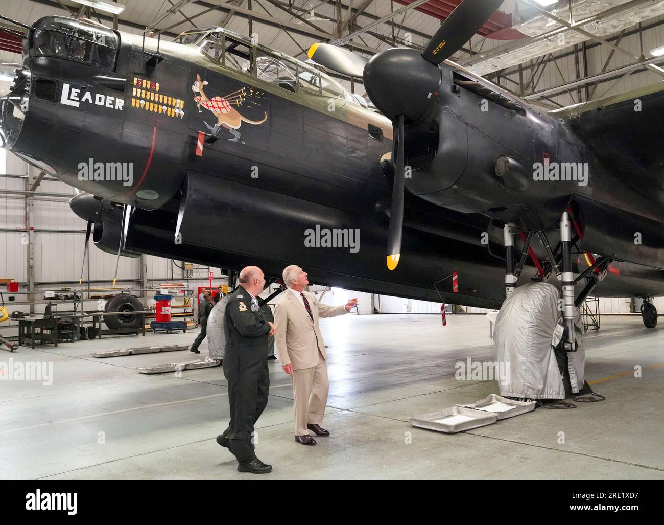 King Charles III, right, speaks with Seb Davey, left, from the Battle ...