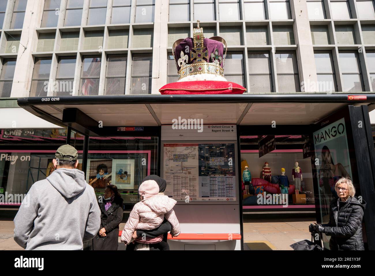 Crown on top of bus stop on Oxford Street to mark the Coronation of ...