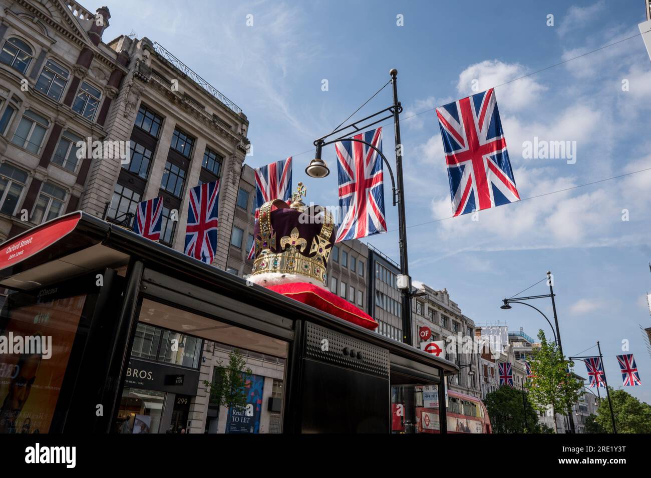 Crown on top of bus stop on Oxford Street to mark the Coronation of ...