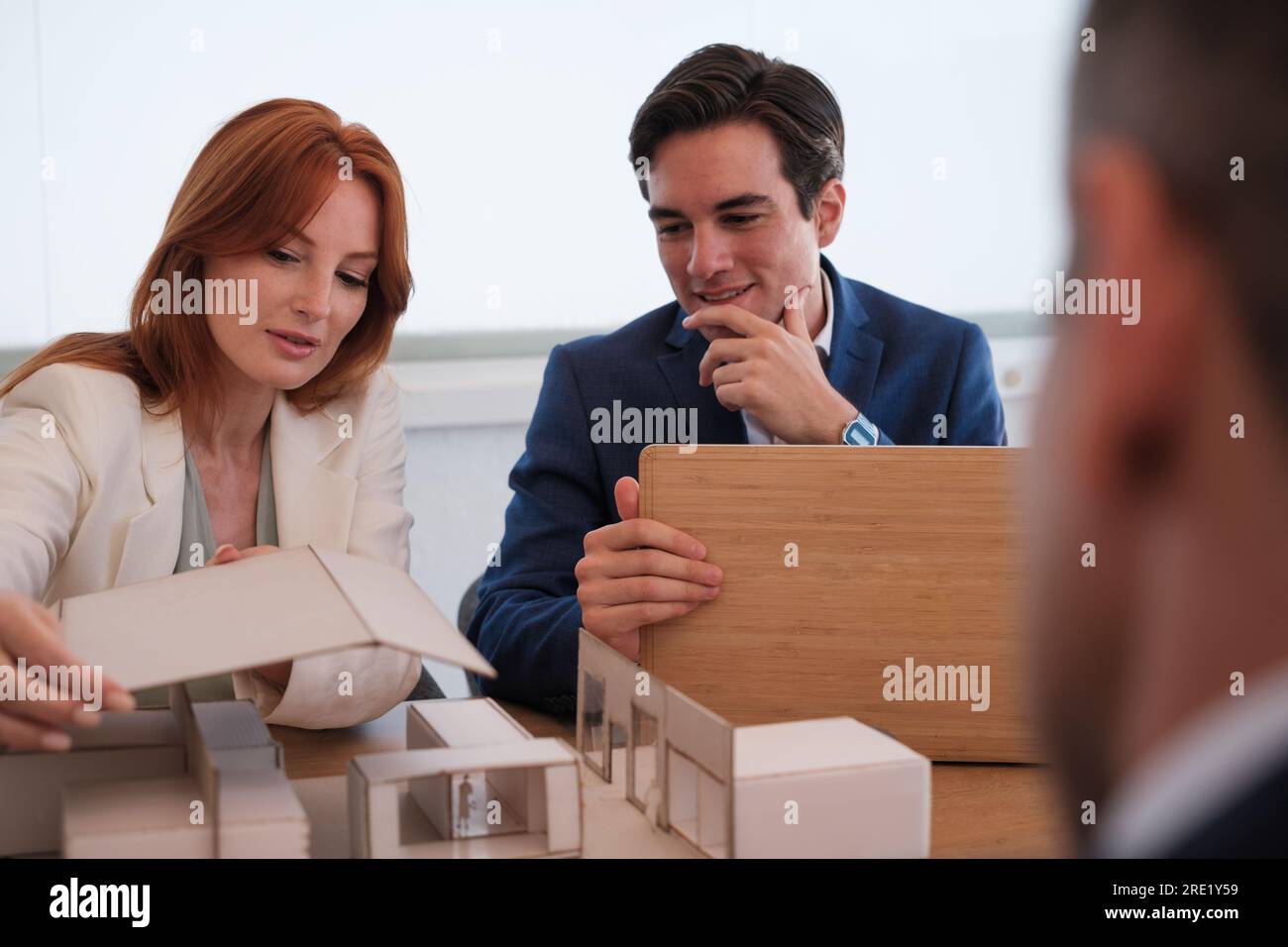 Working group reviewing the model of the company's project. Concept ...