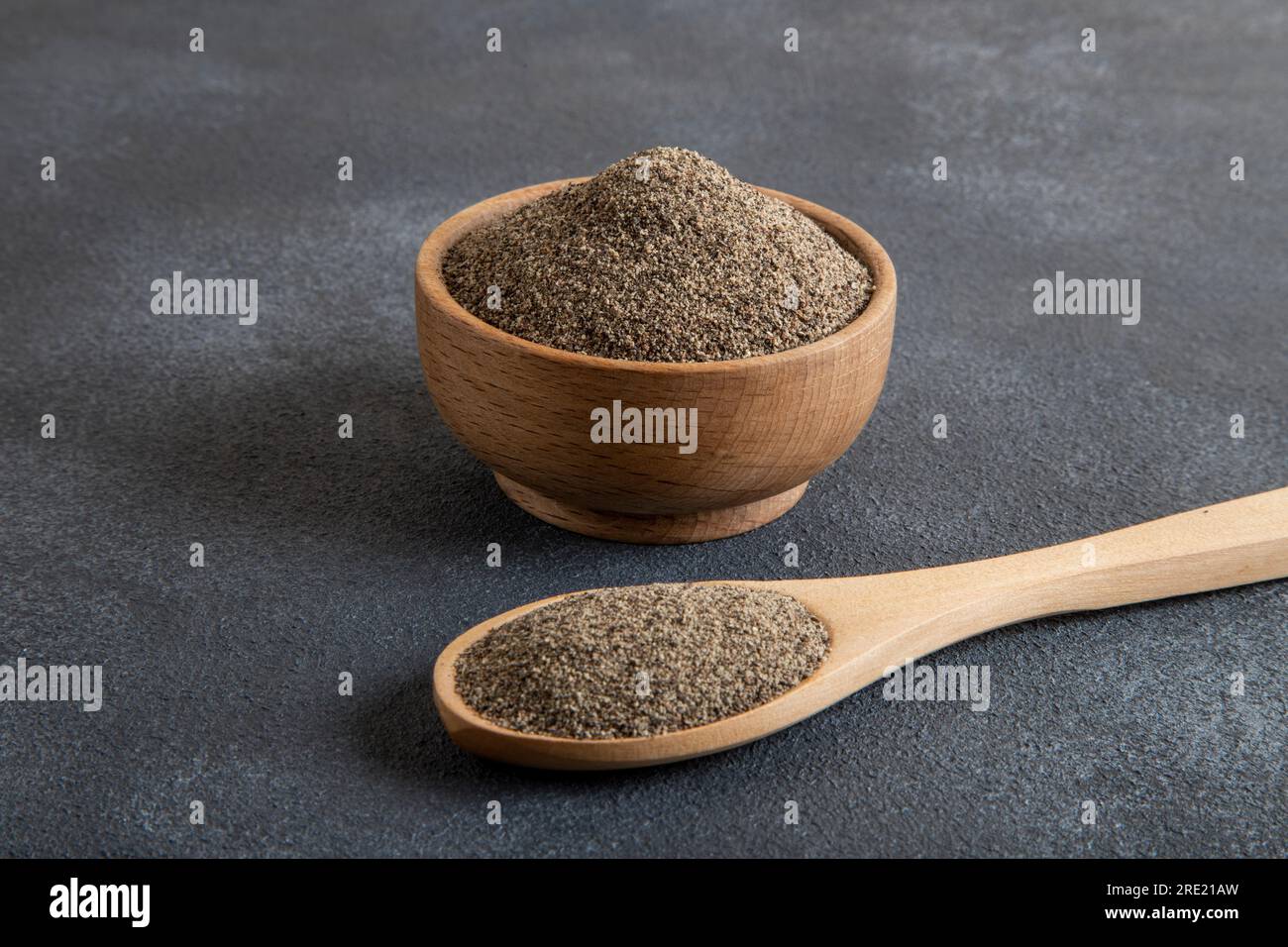 Powder black pepper on black background,closeup Stock Photo - Alamy