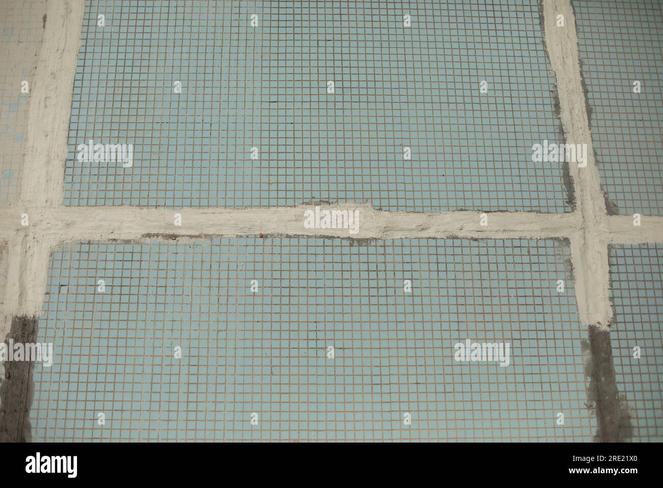 Wall of building without windows. Tiles on building. Architectural ...