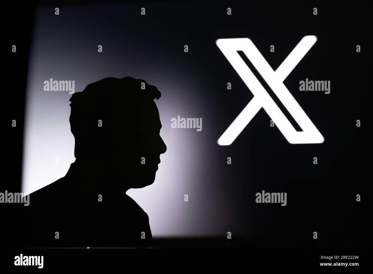 CALIFORNIA, USA, 24. JULY 2023: New logo of Twitter. Silhouette of Elon ...