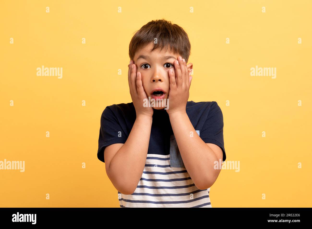 Scared boy frightened and amazed with open mouth Stock Photo - Alamy