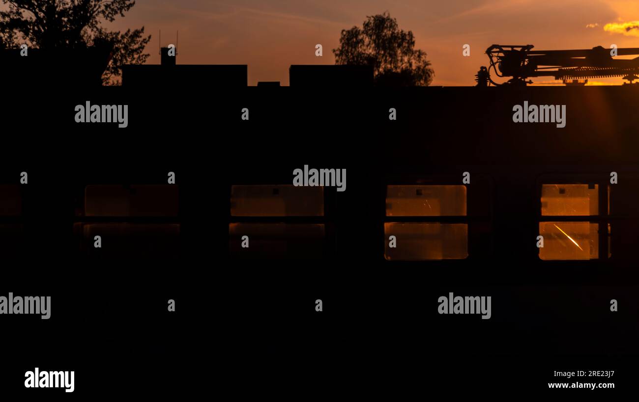 Night on Ostrava Svinov station with old electric train color window ...