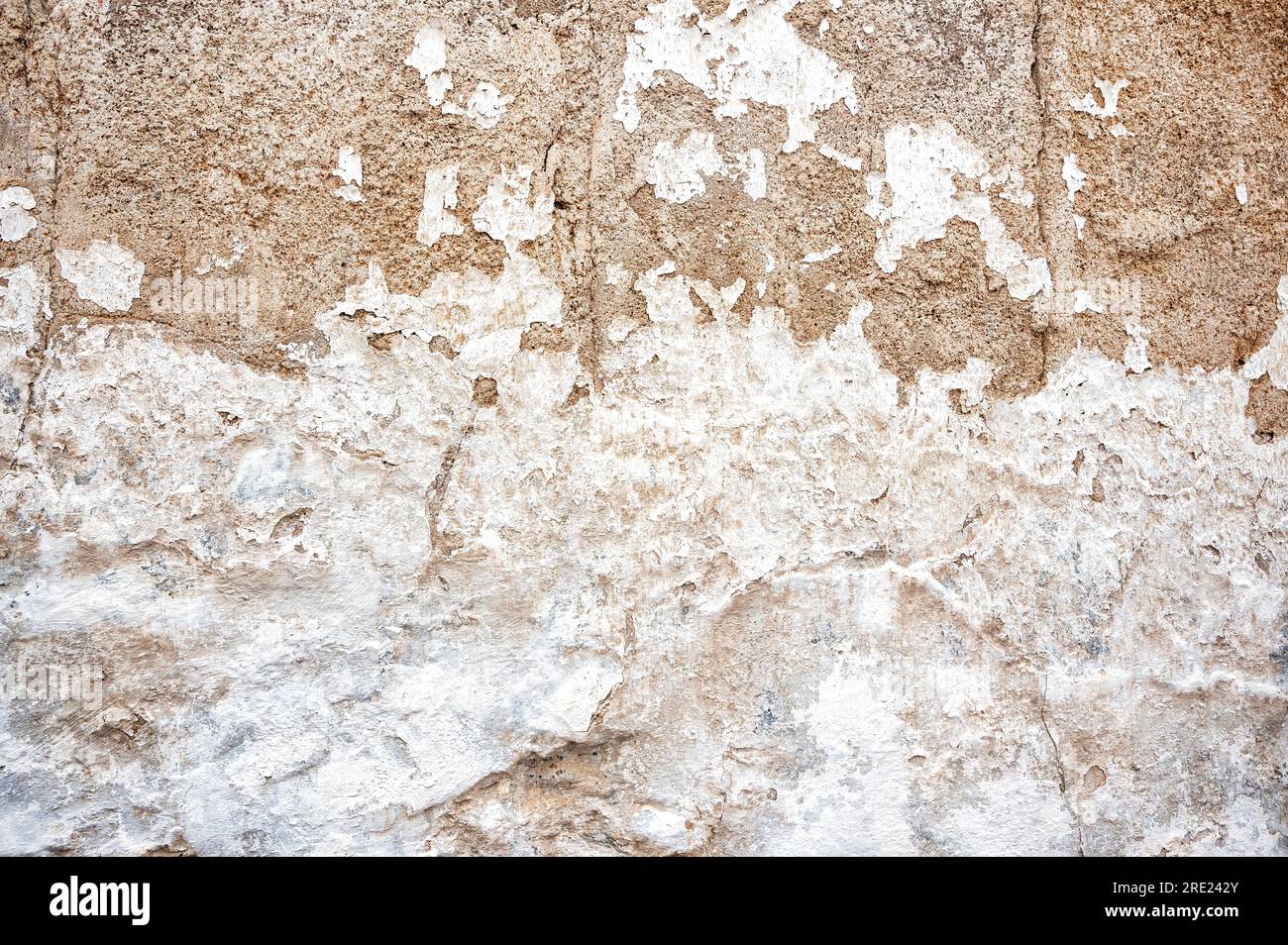 Texture of old wall with damaged white paint that covered it Stock ...