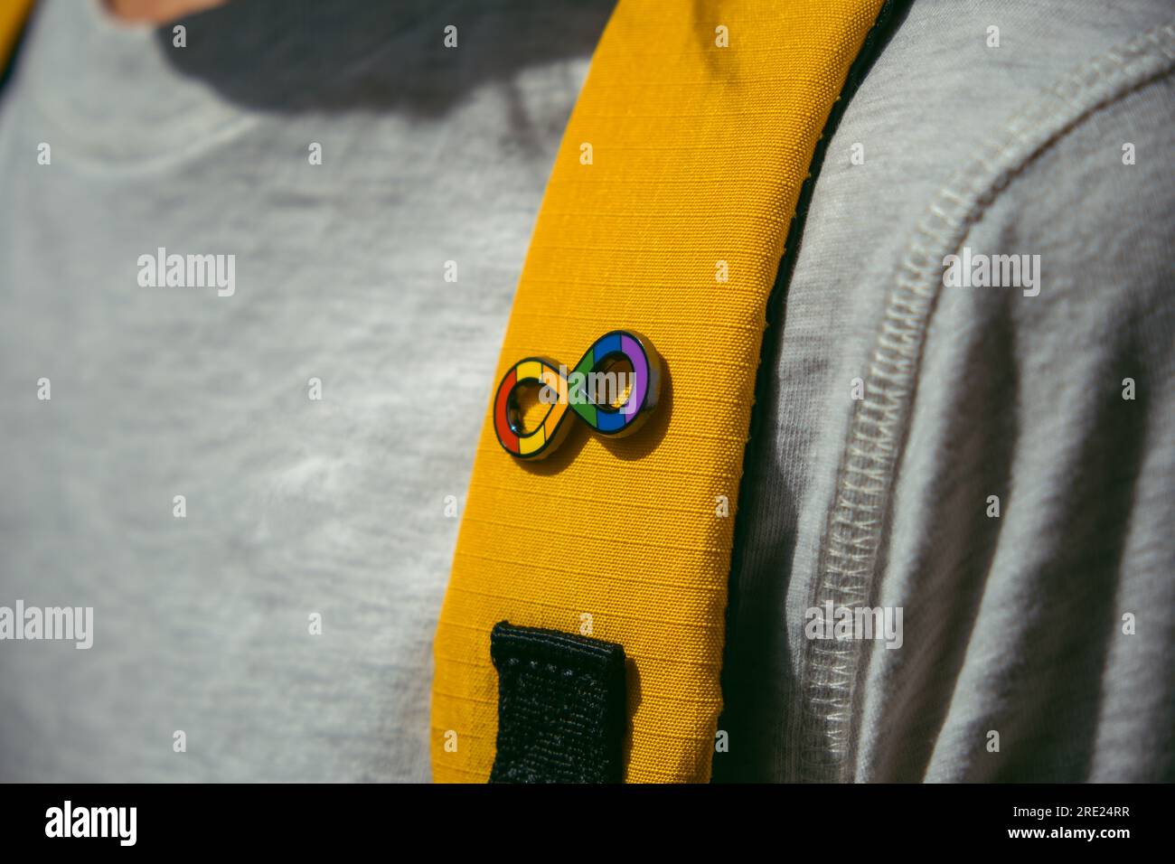 Kid with backpack with autism infinity rainbow symbol sign. World ...