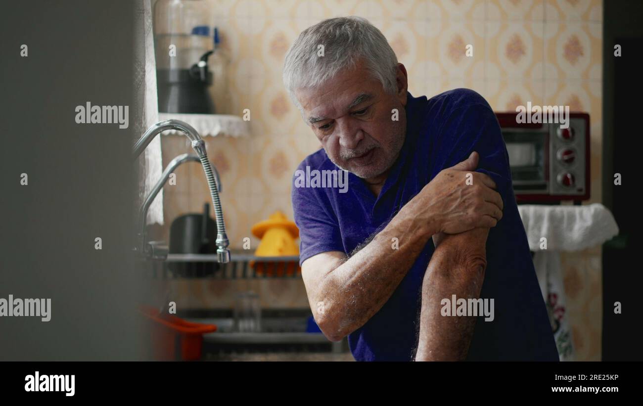 Depressed anxious senior man struggles with old age at home, dramatic ...