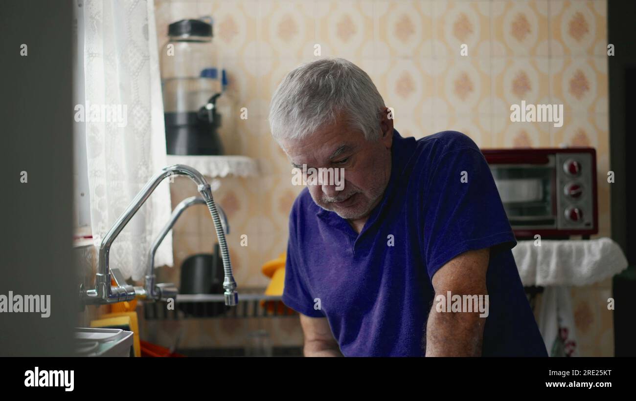 Depressed anxious senior man struggles with old age at home, dramatic ...