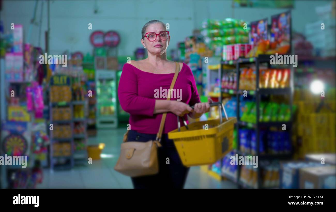 Female Shopper Coping with Economic Difficulties in Supermarket ...