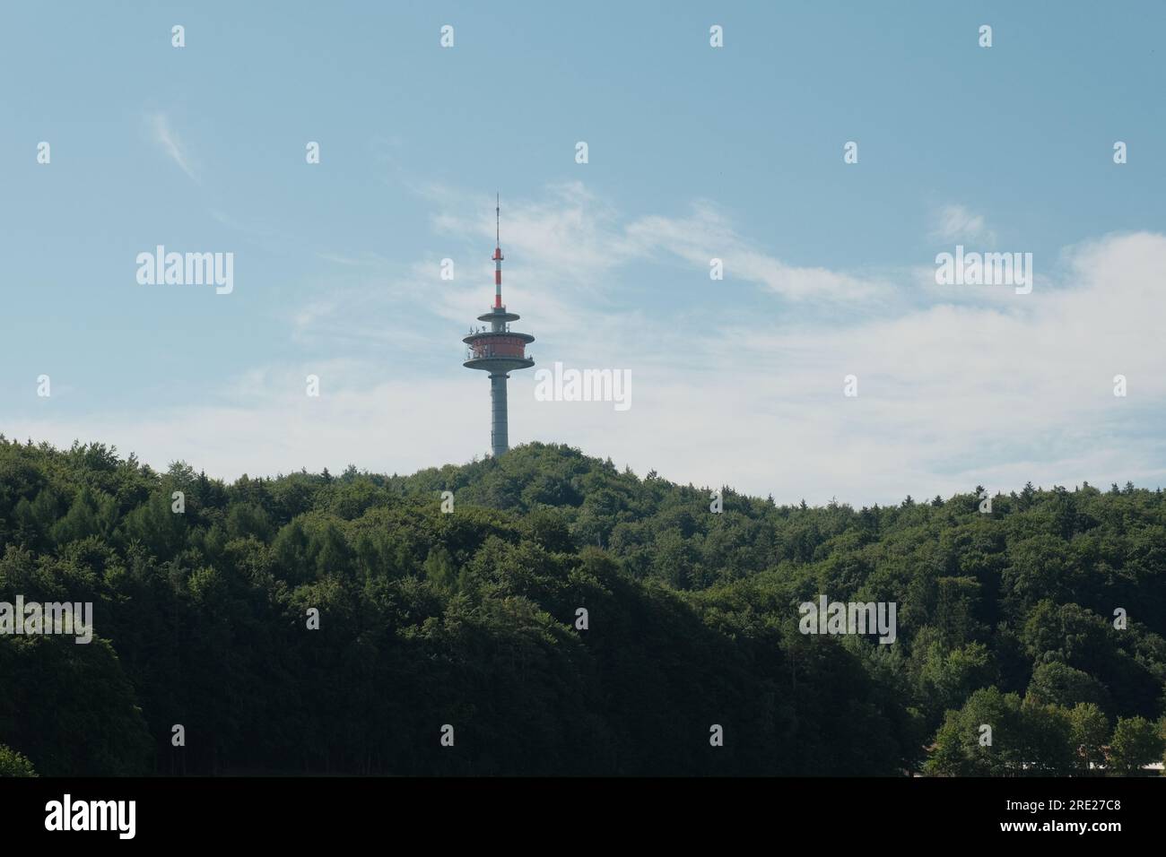 The German TV tower peeks out imposingly over a sprawling town and its ...