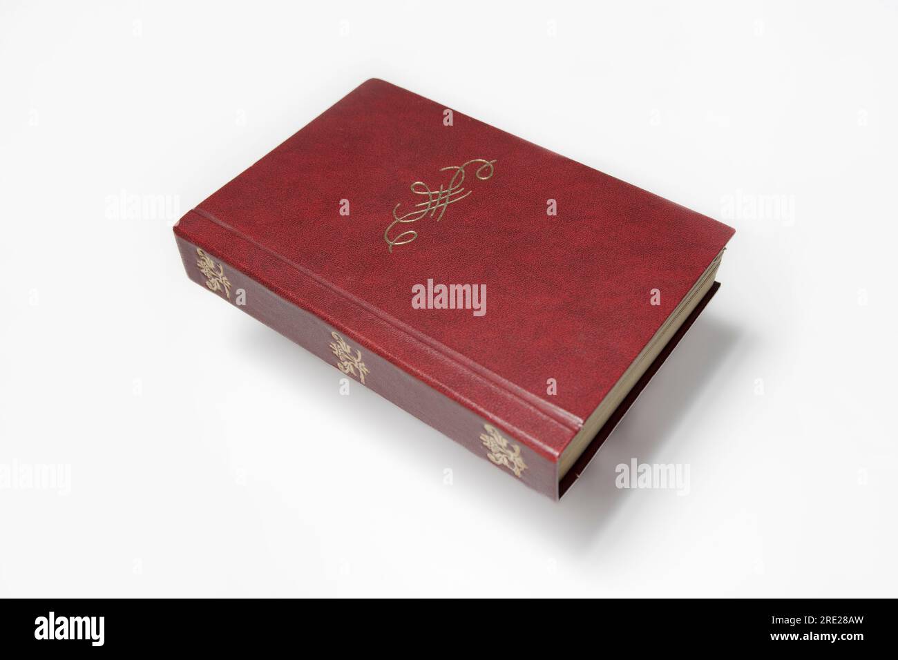 An untitled old book with an antique stylized monogram and free space ...