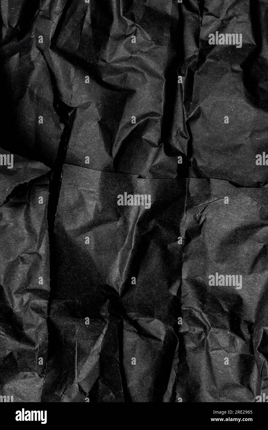 Texture of black crumpled paper. Dark paper background with chaotic ...
