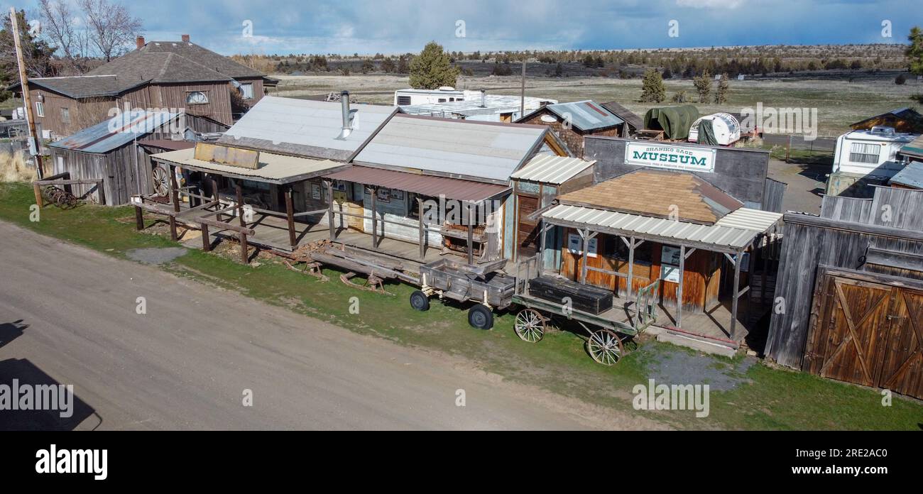 Low aerial view of Shaniko Oregon, which is considered a ghost town ...