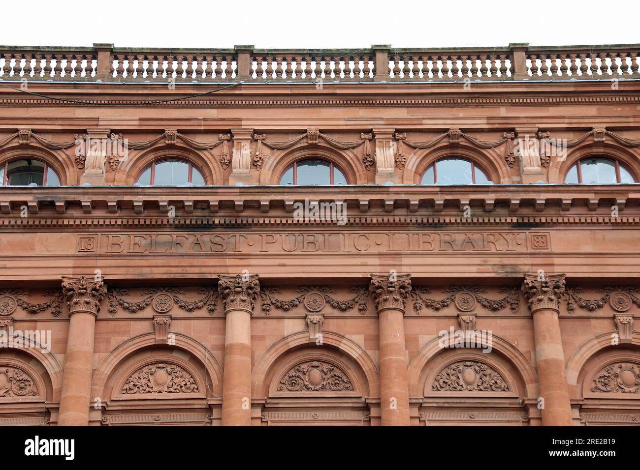 Red sandstone facade of Belfast Central Library Stock Photo - Alamy
