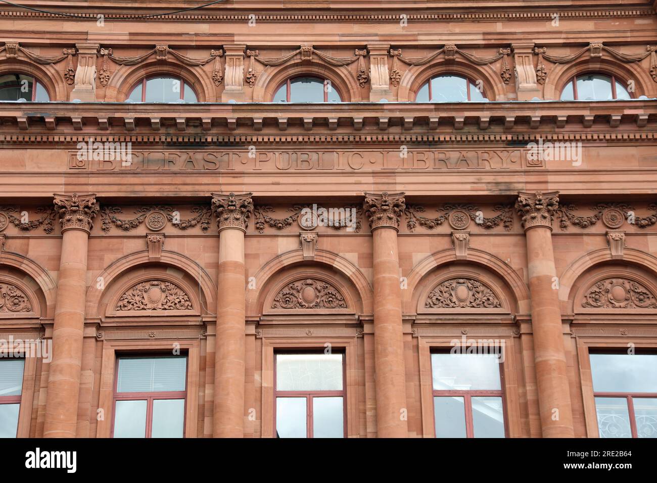 Red sandstone facade of Belfast Central Library Stock Photo - Alamy