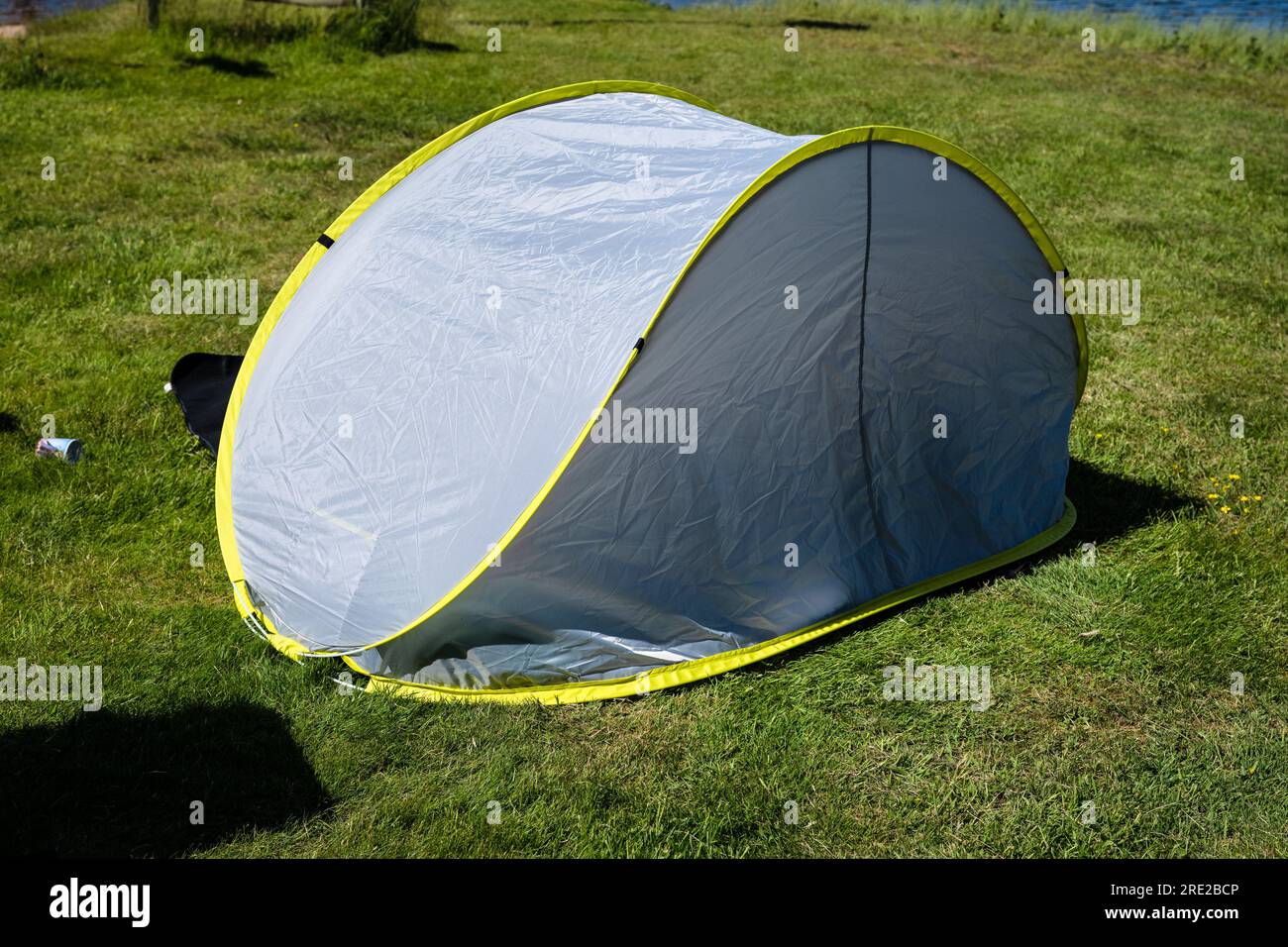 Tent yellow grass hi-res stock photography and images - Alamy