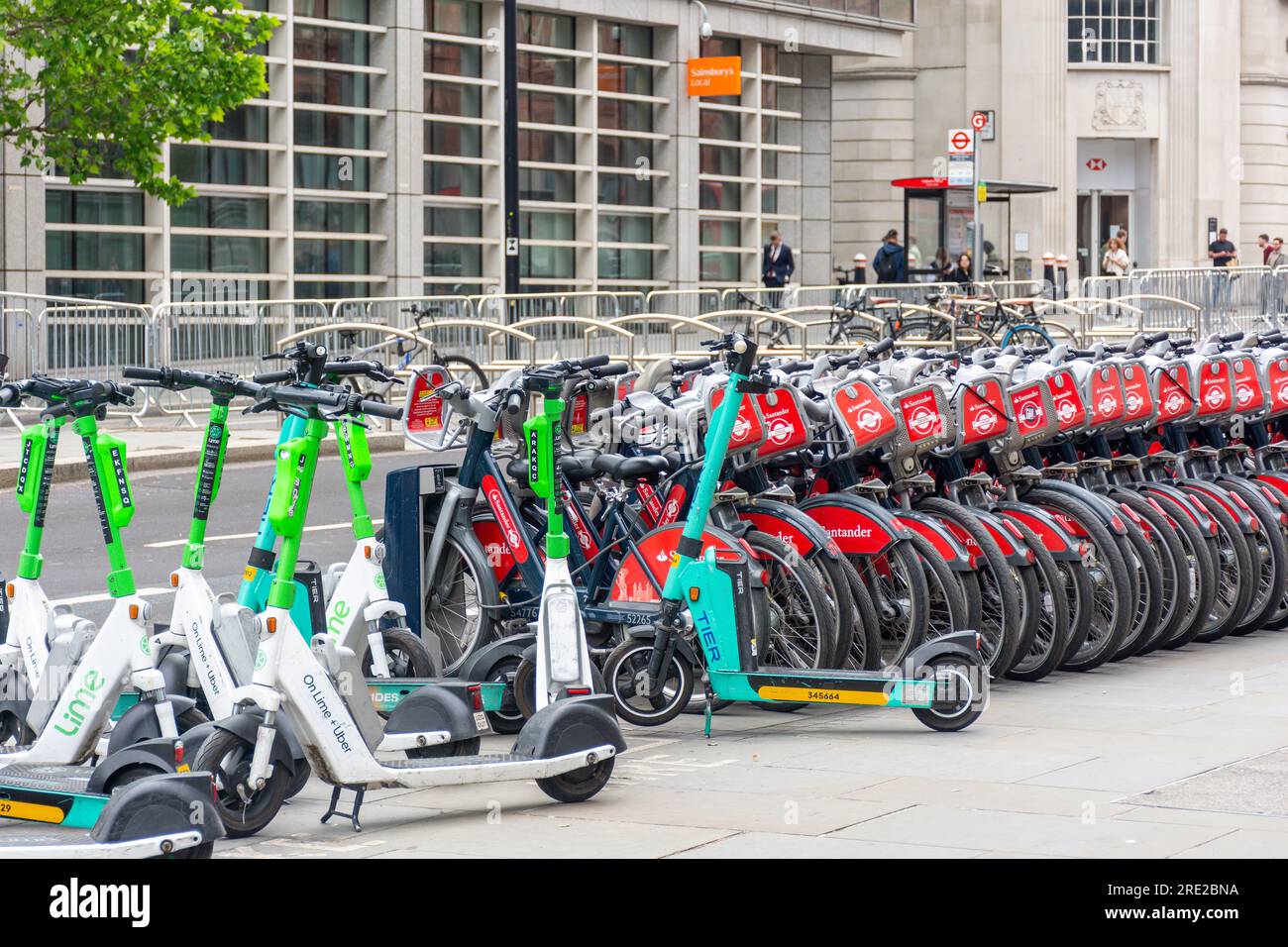 Free public transport racks of hire bikes and electric scooters hi-res stock photography and ...