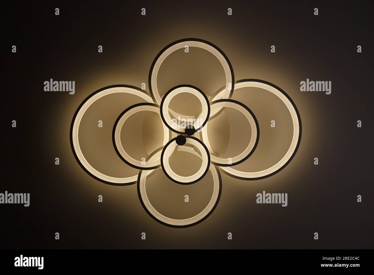 Luminous modern LED ring lamp on the ceiling. Bottom view Stock Photo ...