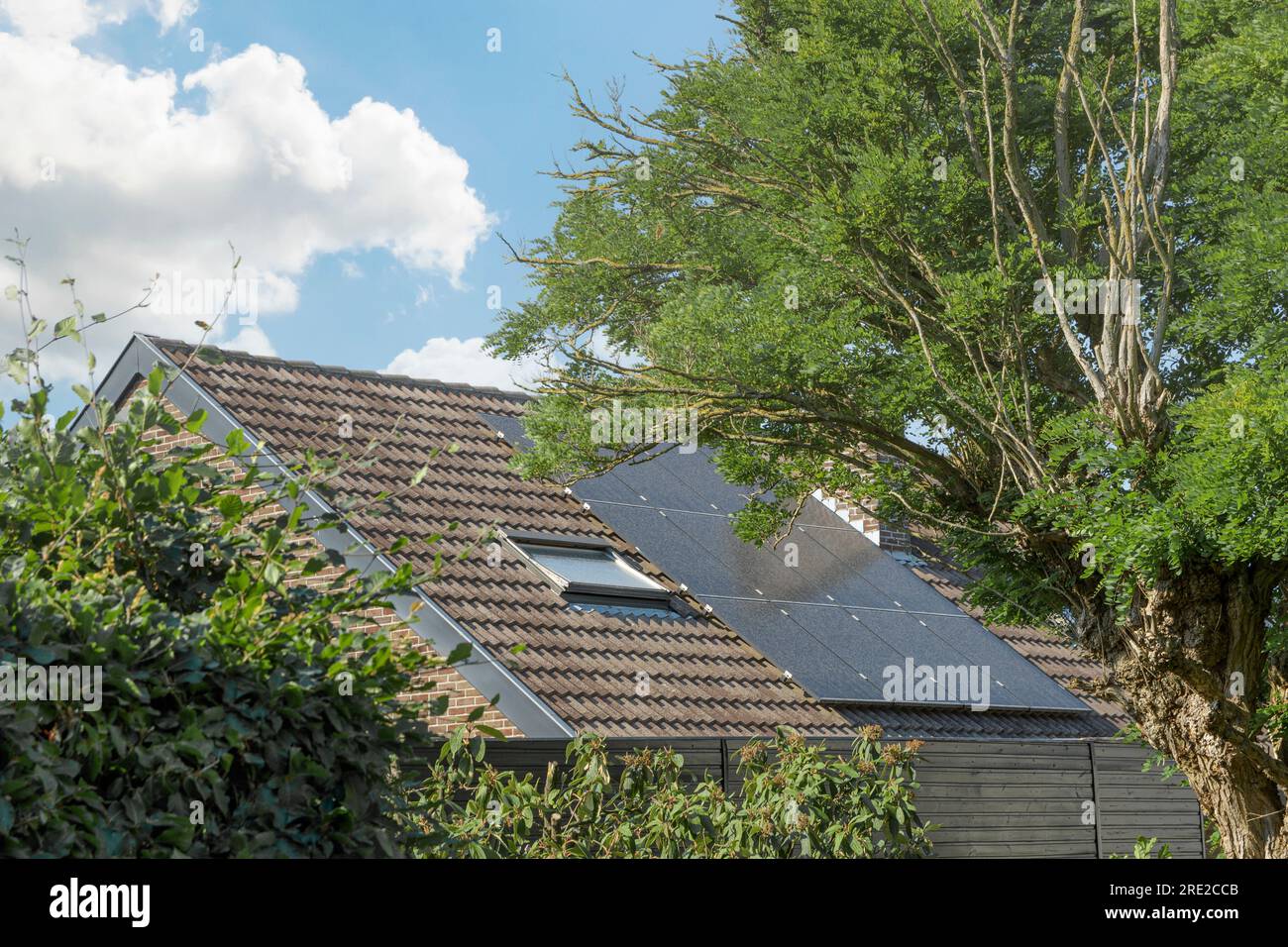 Solar panels on the roof of a one-story house with a corner roof Stock ...