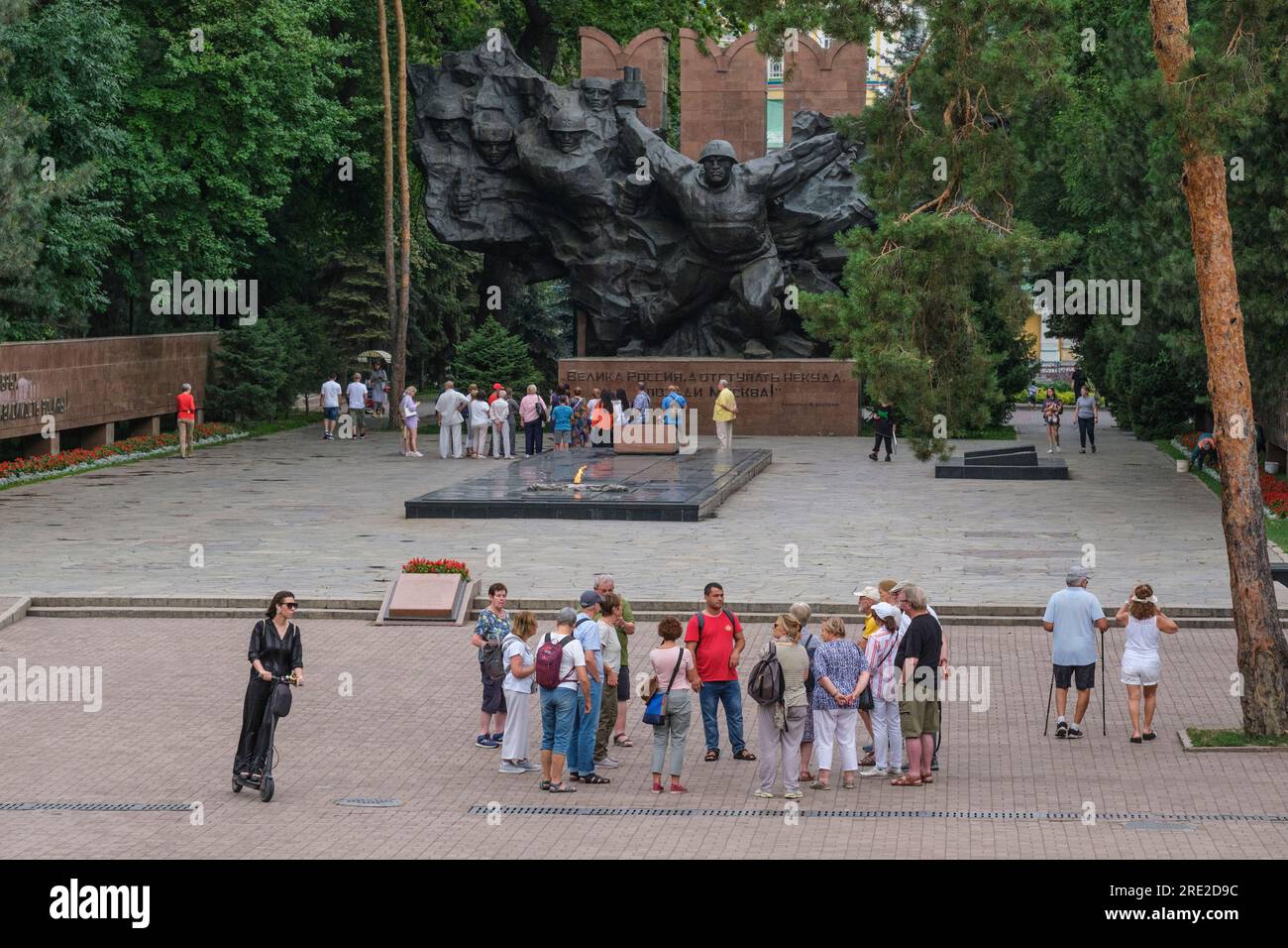 Kazakhstan, Almaty. Tourists at the Soviet-era Monument to World War II ...