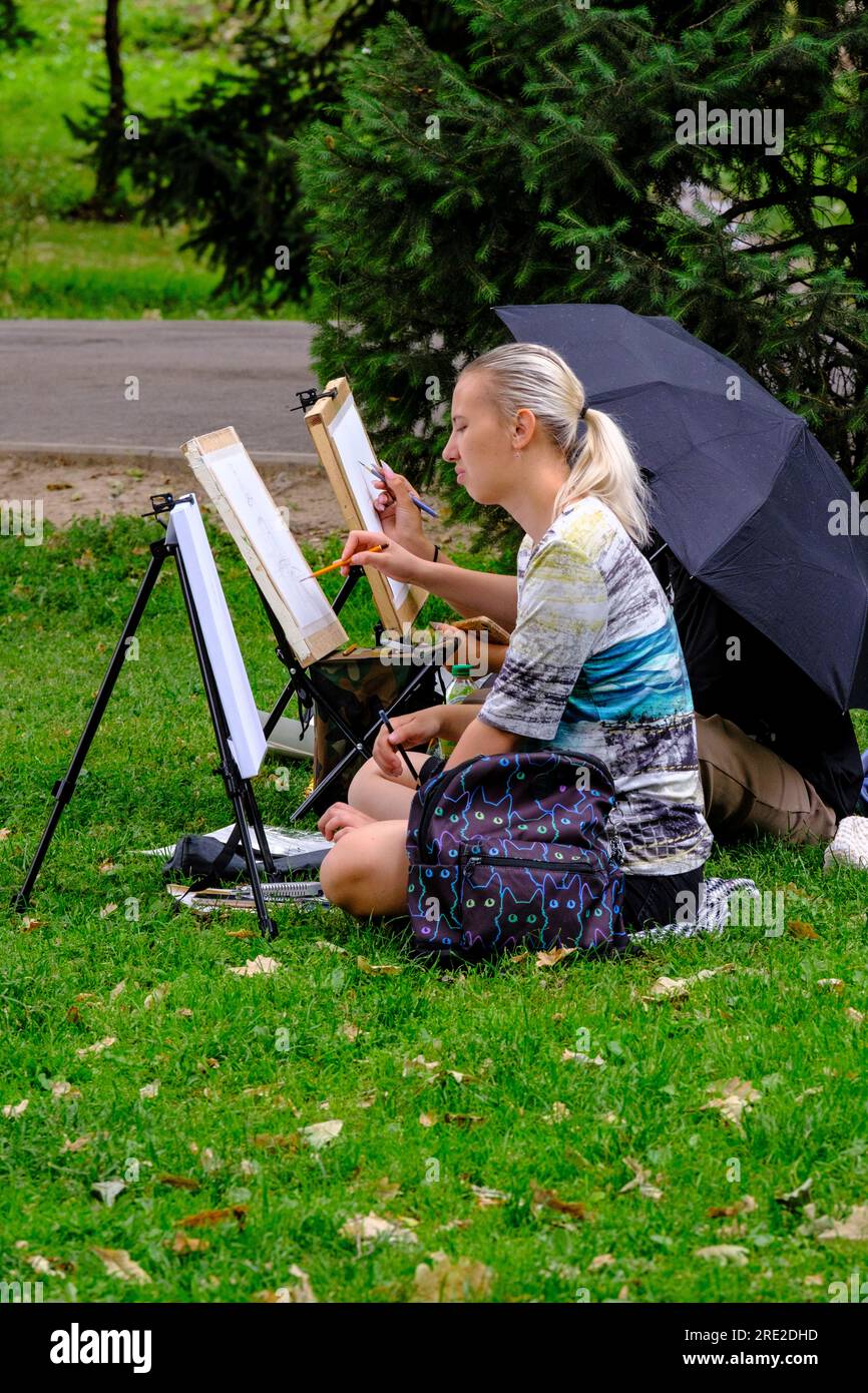 Kazakhstan, Almaty. Art Students Sketching in Panfilov Guardsmen Park ...
