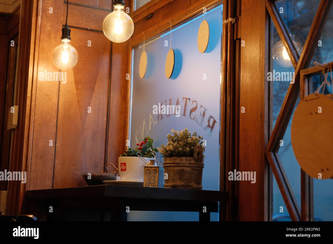 An inviting indoor view from a Romanian restaurant, featuring a glass ...