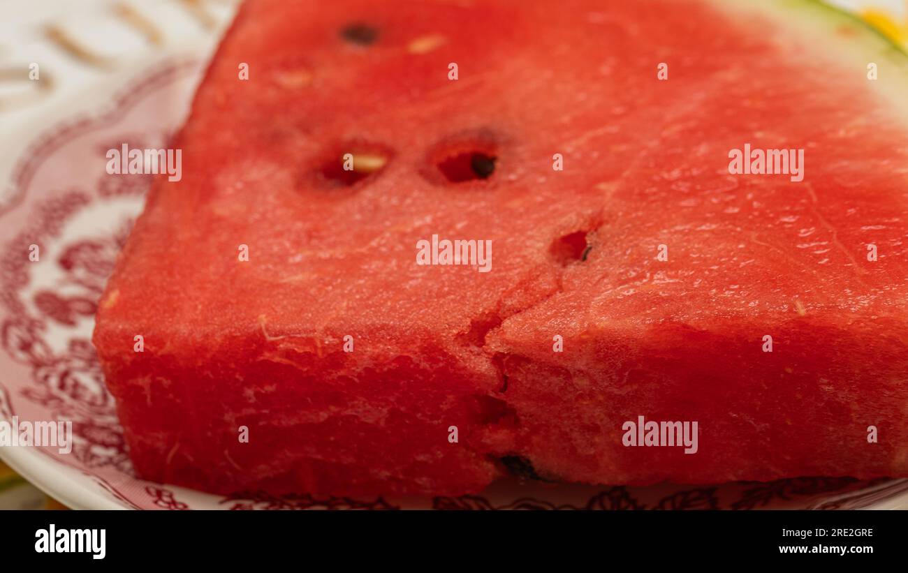 Watermelon slice on plate hi-res stock photography and images - Alamy