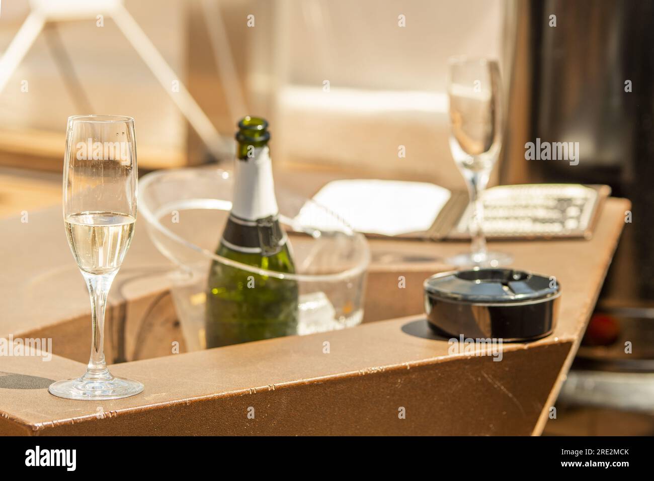 A few glasses of cava filled with sparkling liquid next to a ...