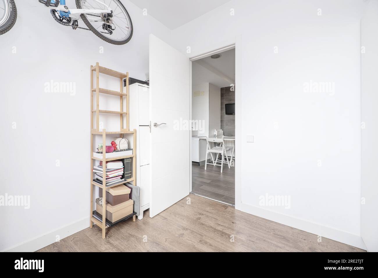 A room in a residential house dedicated to a storage room with shelves ...