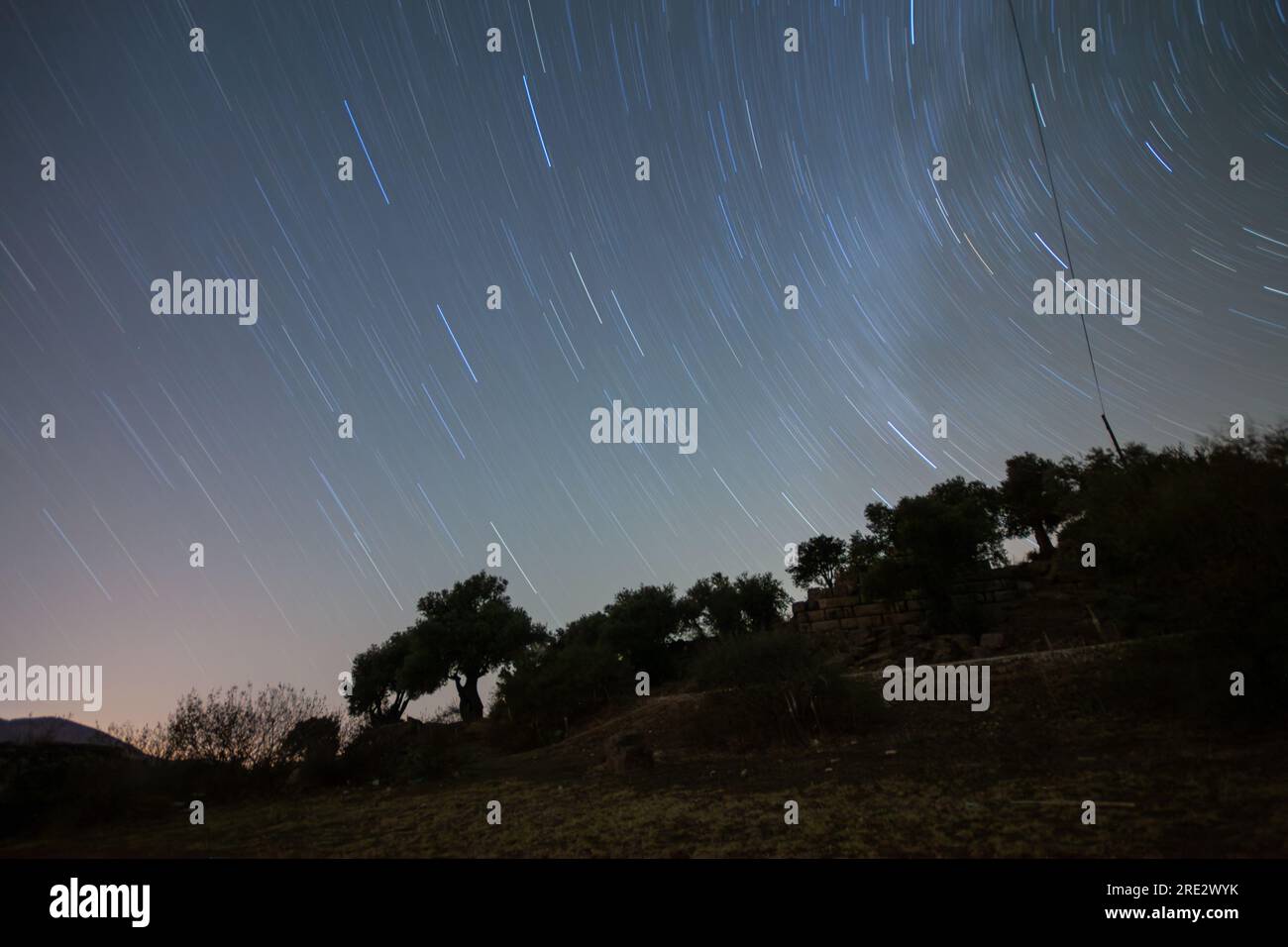 A view of the stars of the Milky Way with a mountain top in the ...
