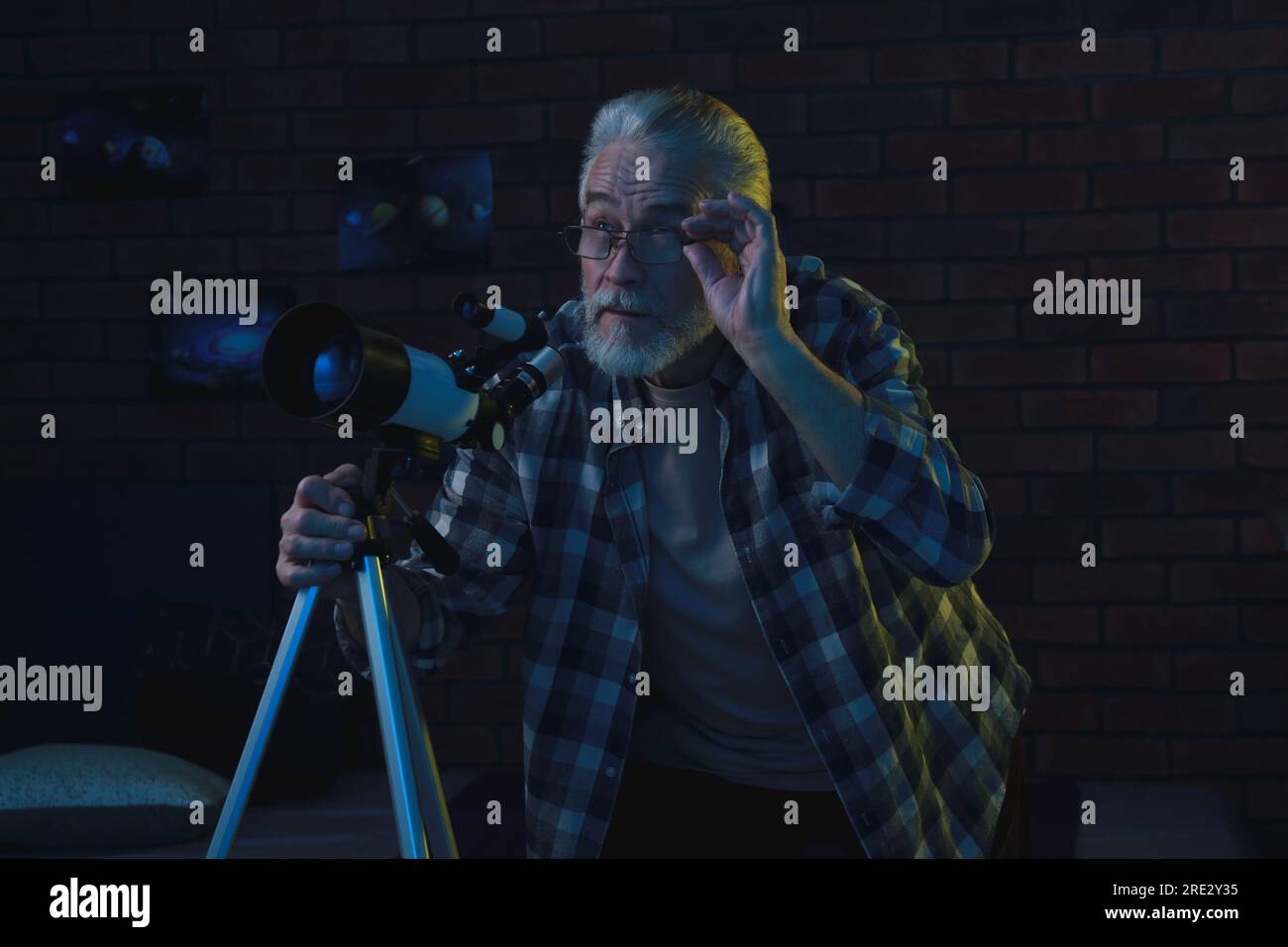 Person using telescope at night hi-res stock photography and images - Alamy