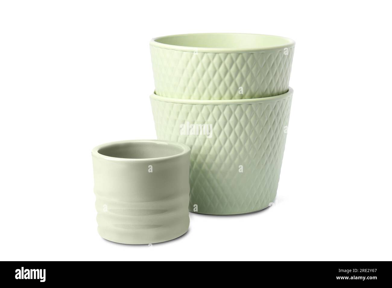 Different empty ceramic flower pots on white background Stock Photo - Alamy