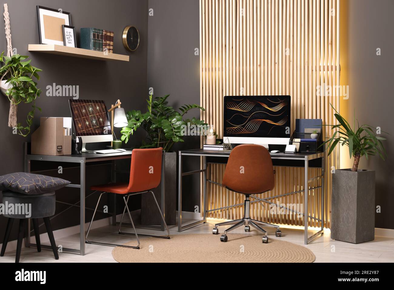 Cozy workspace with computer on metal desk at home Stock Photo - Alamy