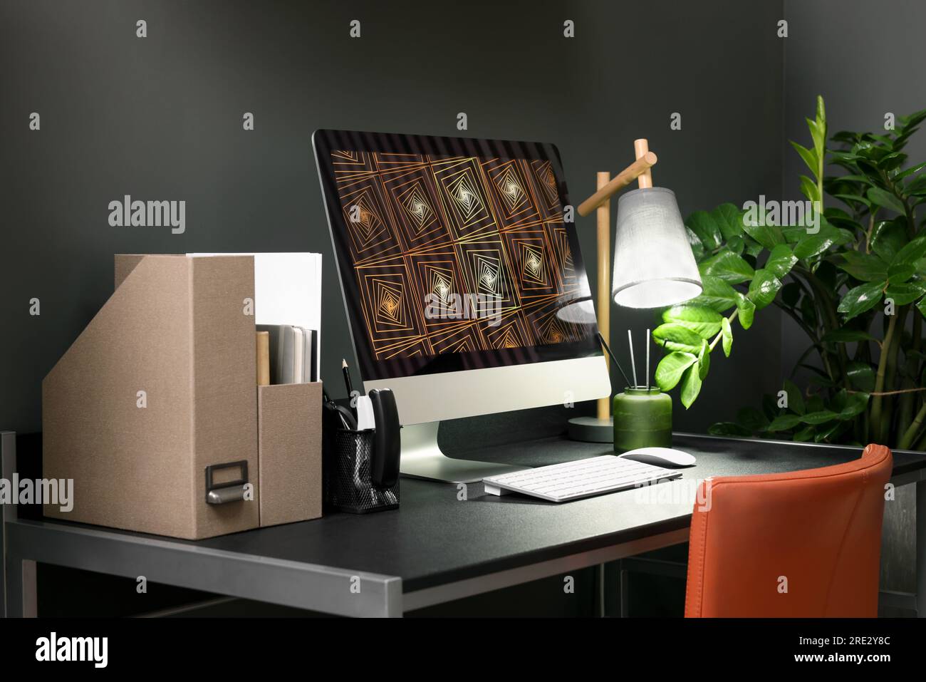 Cozy workspace with computer on metal desk at home Stock Photo - Alamy