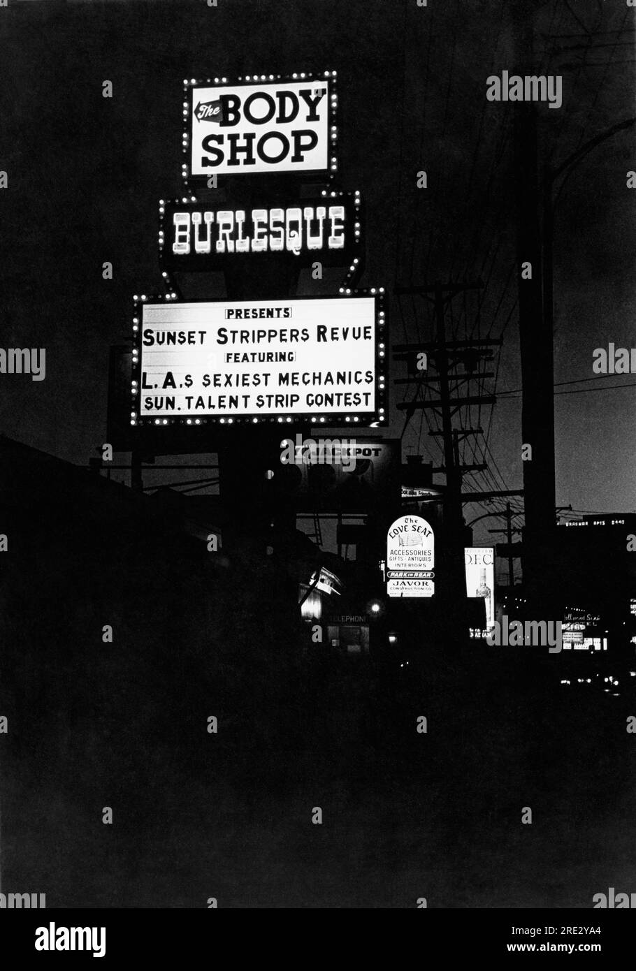 Los Angeles, California: c. 1968. Nighttime view of the Body Shop ...