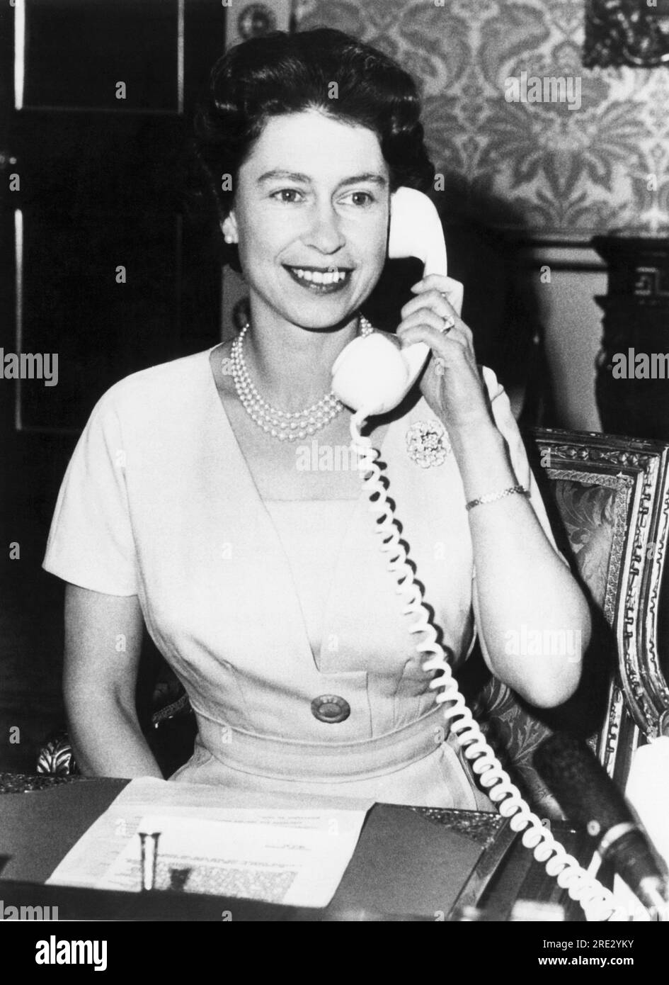 London, England: December 19, 1961 Britain's Queen Elizabeth talks to ...