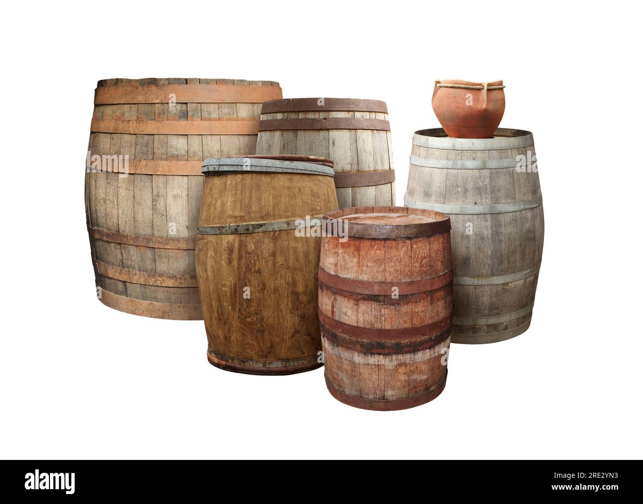 Many different wooden barrels and clay pot on white background Stock ...