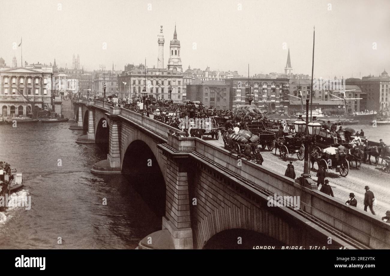 London, England: c. 1885 Wagons, carts and pedestrian traffic on the ...