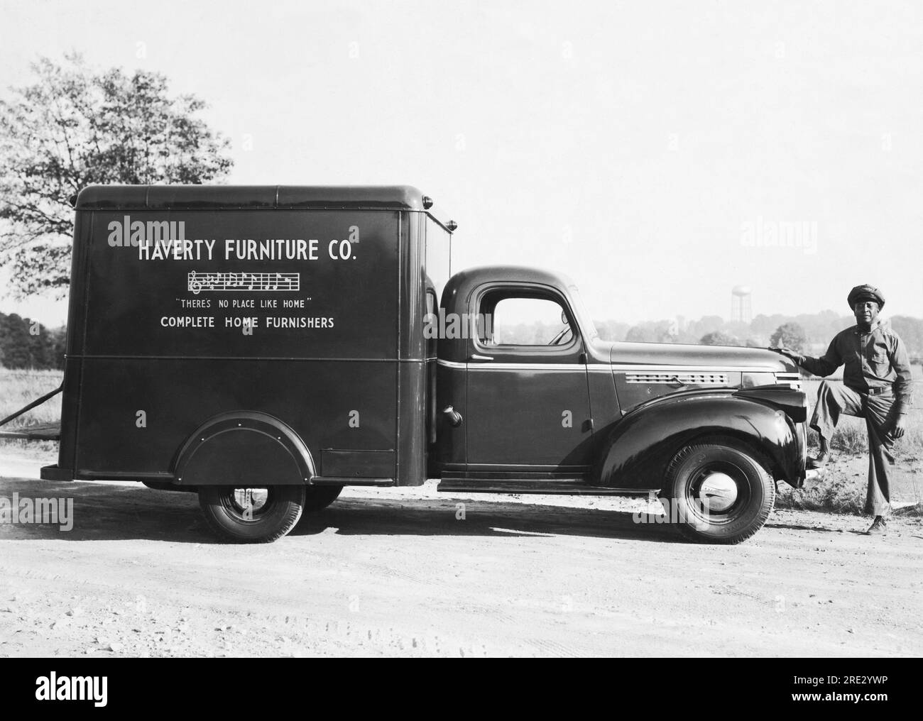 Rock Hill, South Carolina: c. 1938 An African American man stands by ...
