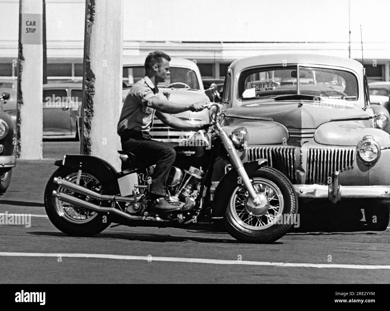 San Francisco, California c. 1954 A man riding his Harley-Davidson ...