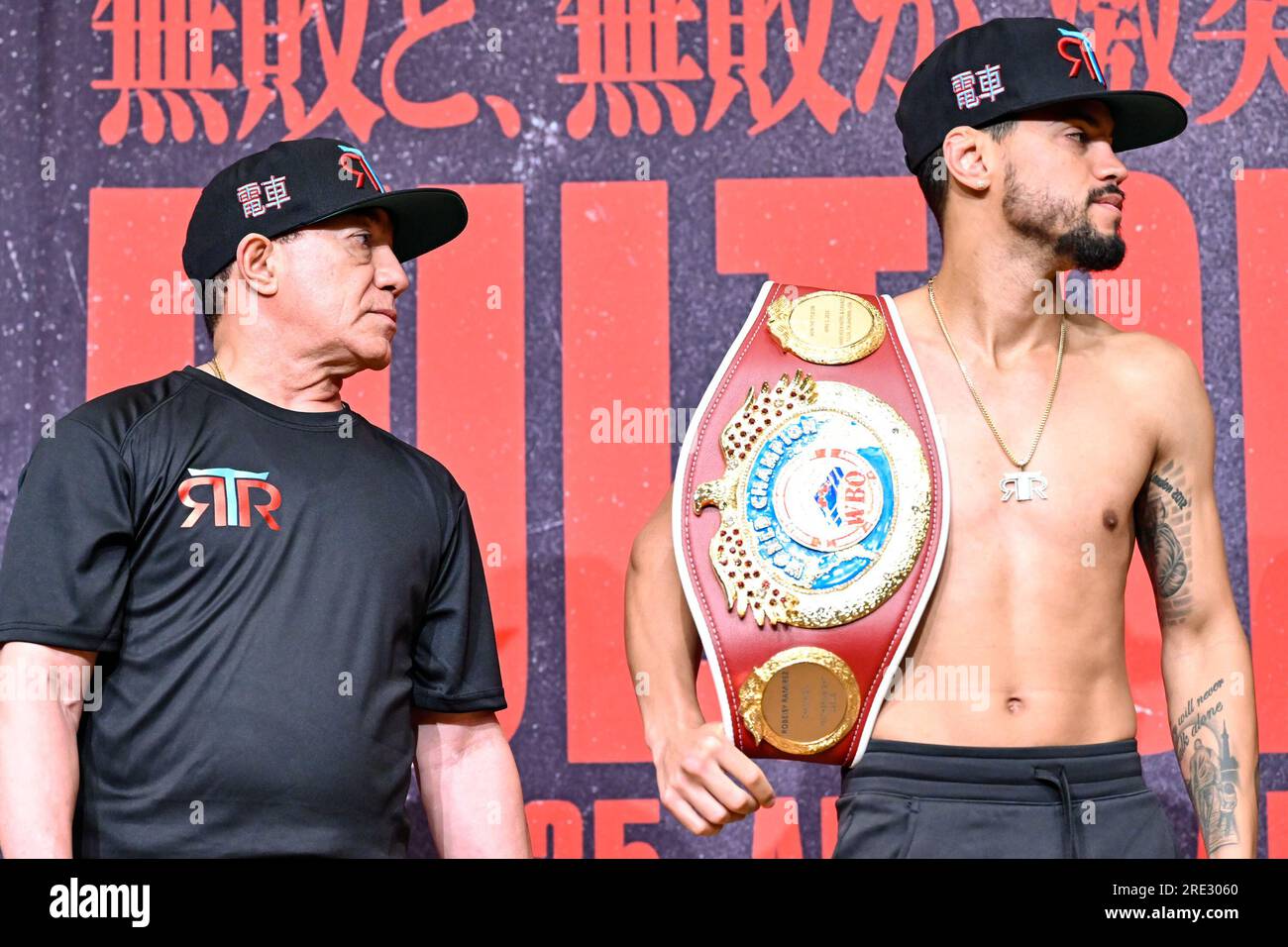 Champion Robeisy Ramirez (R) of Cuba and his trainer Ismael Salas ...