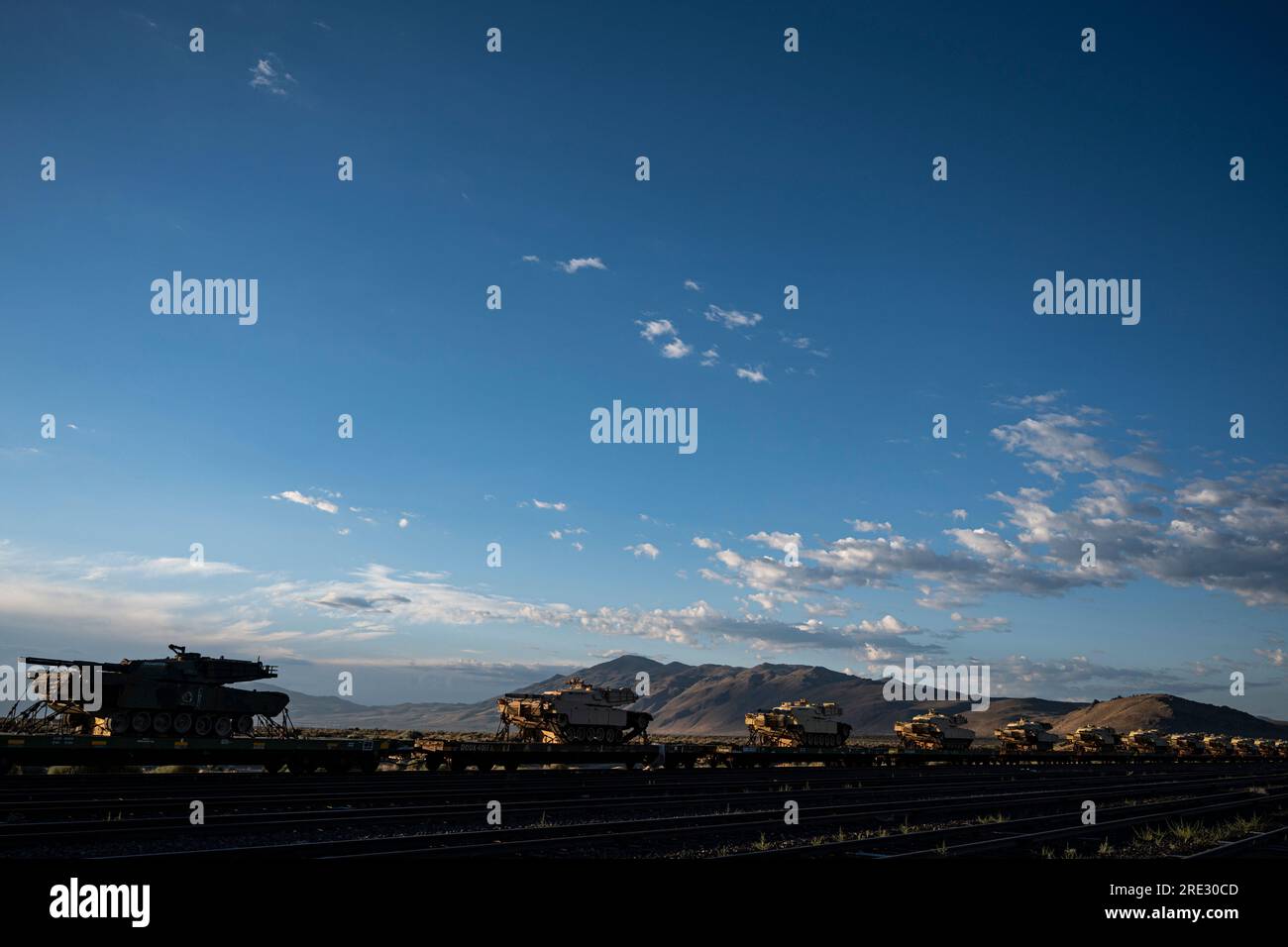 U.S. Army M1 Abrams tanks sit atop railway flatcars at the Sierra Army ...