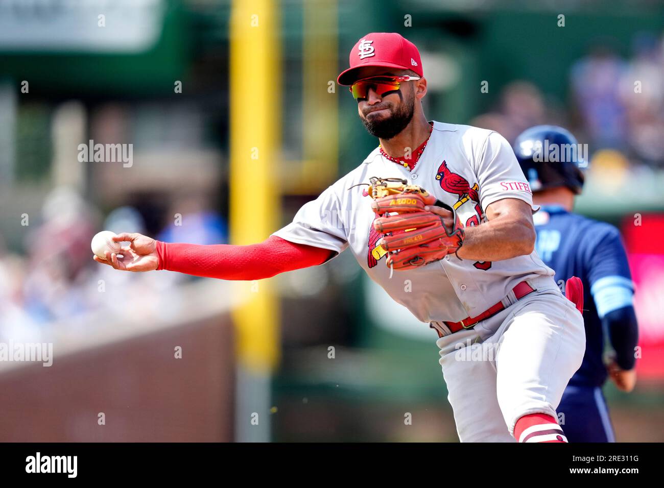St. Louis Cardinals second baseman Jose Fermin throws to first during a baseball game against ...