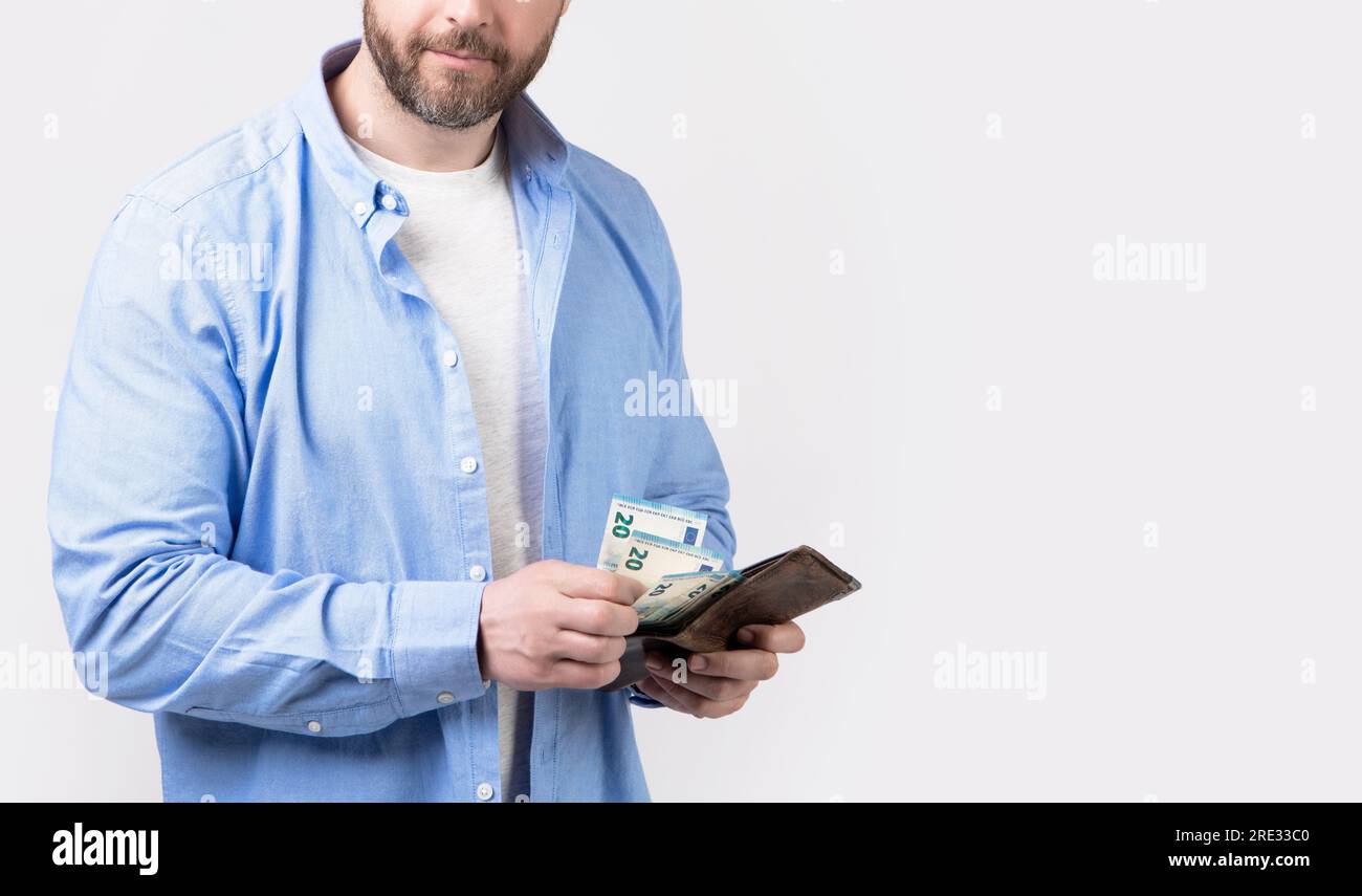 photo of man pay salary, copy space. man pay salary isolated on studio ...