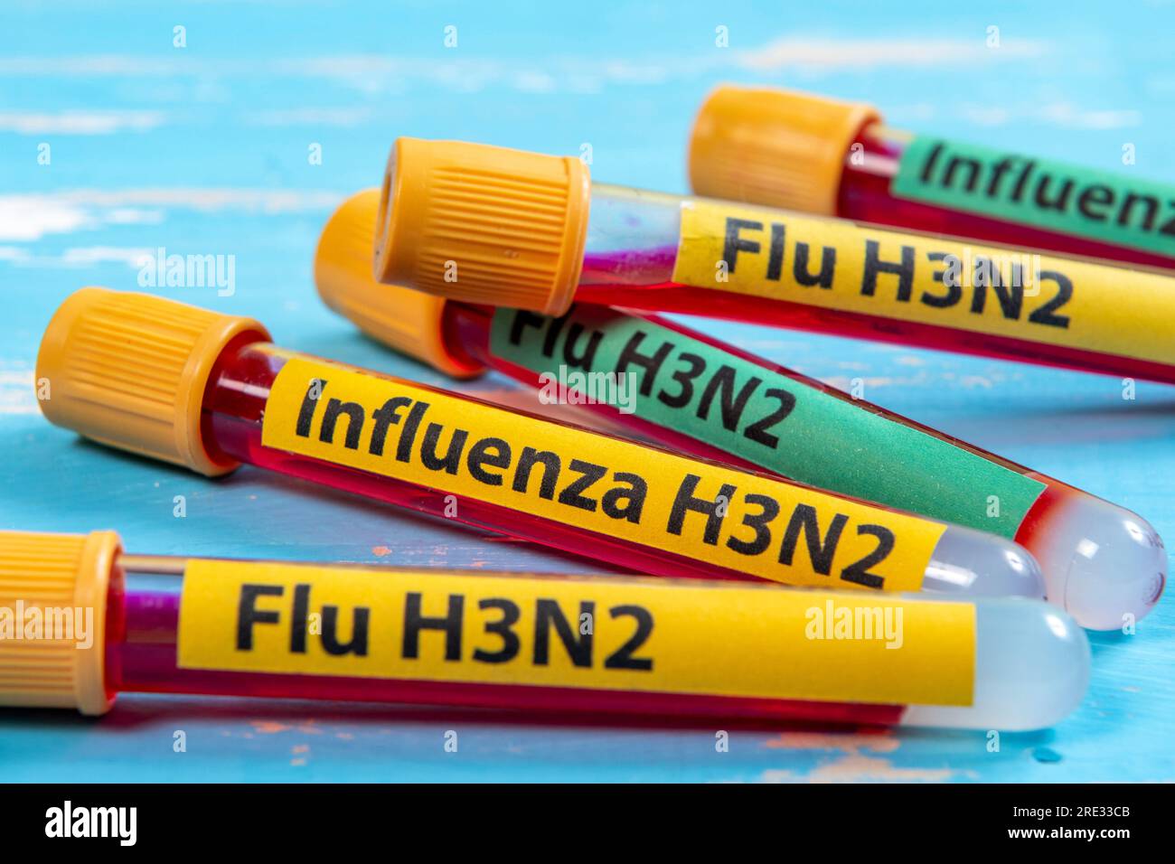 vacuum vials for blood collection written FLU H3N2 in reference to the ...