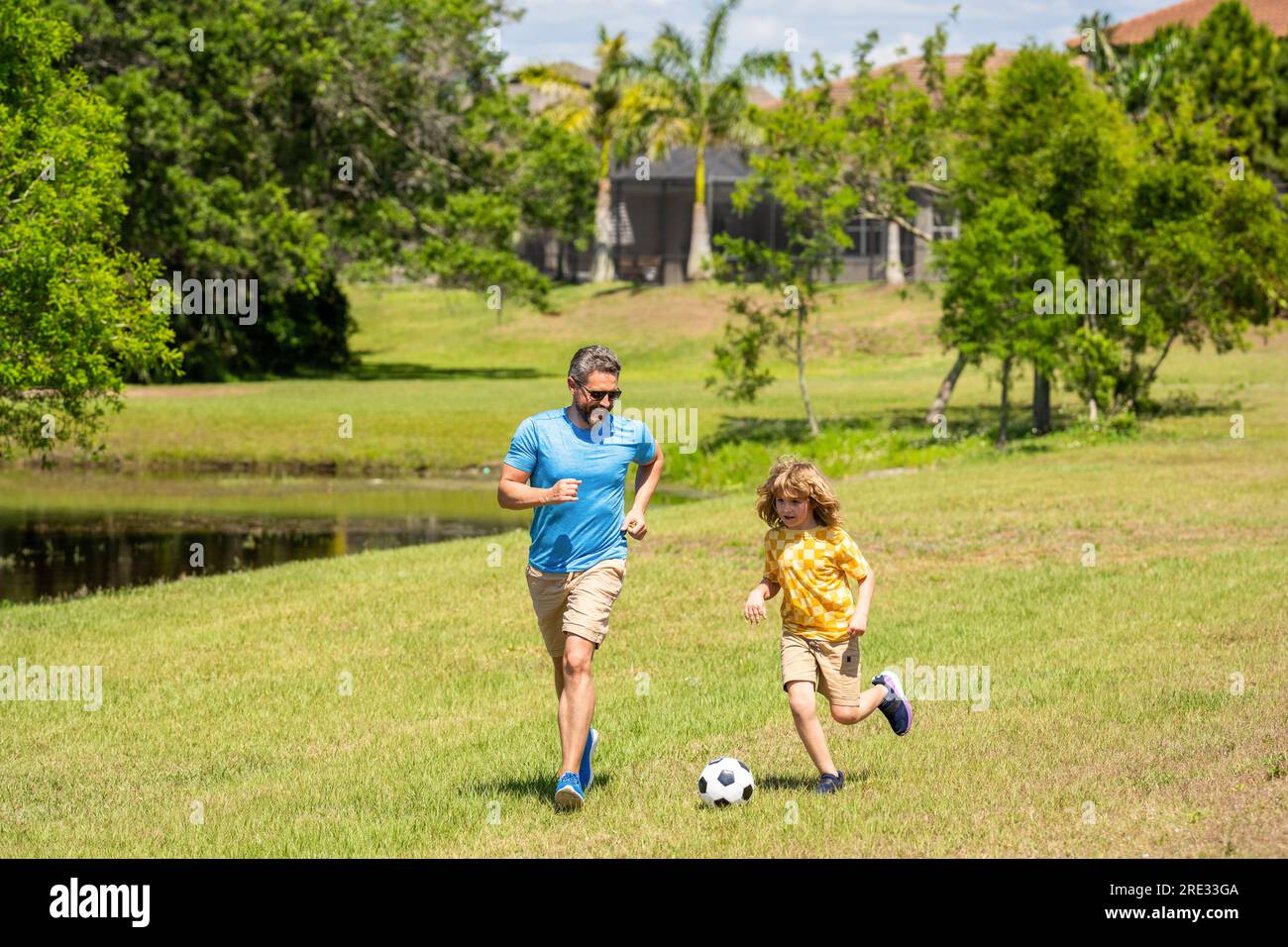 Father dad and son enjoy outdoor activities together. Outdoor ...