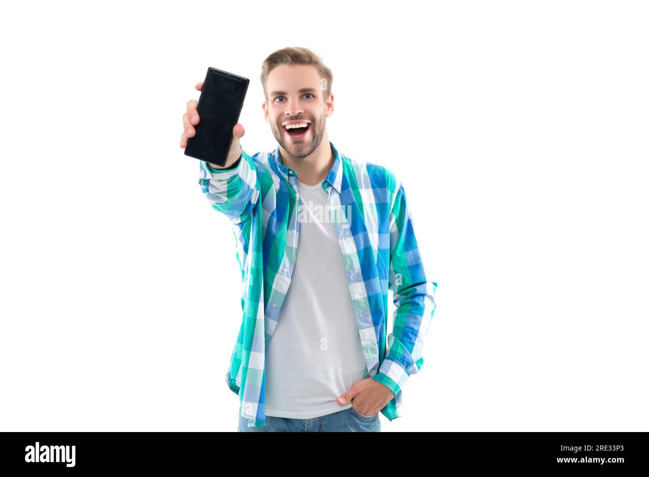 happy man with phone screen isolated on white. man shows phone screen ...